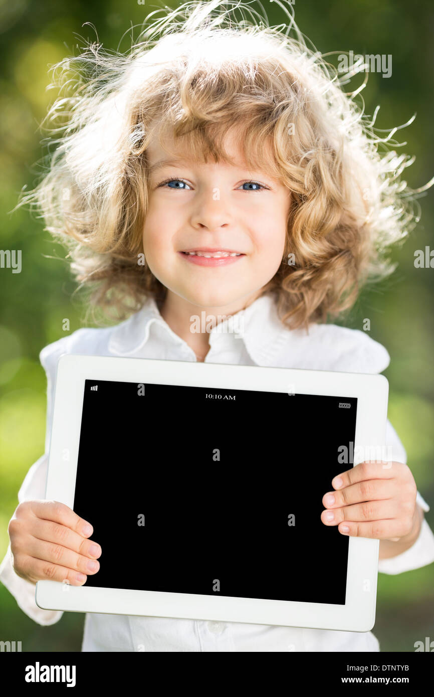 Girl holding computer pad hi-res stock photography and images - Alamy