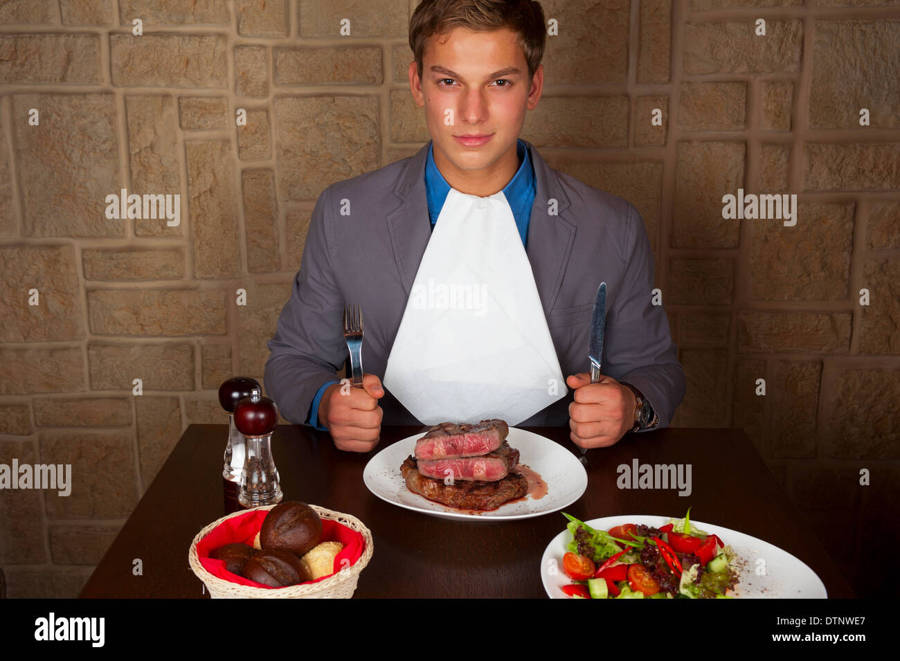 eat a beef steak Stock Photo - Alamy