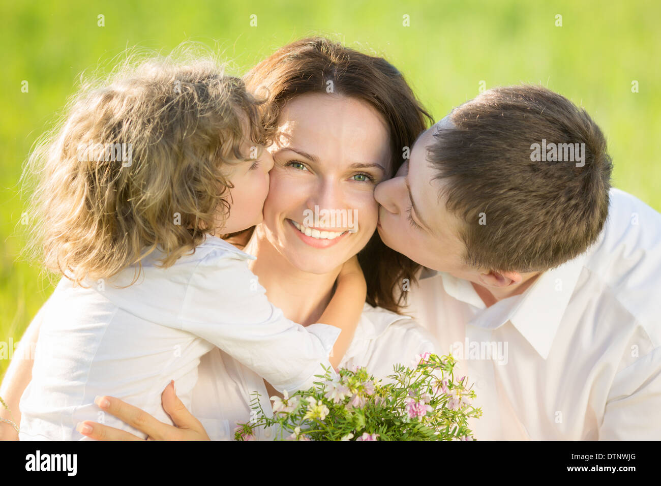 Happy family outdoors Stock Photo - Alamy