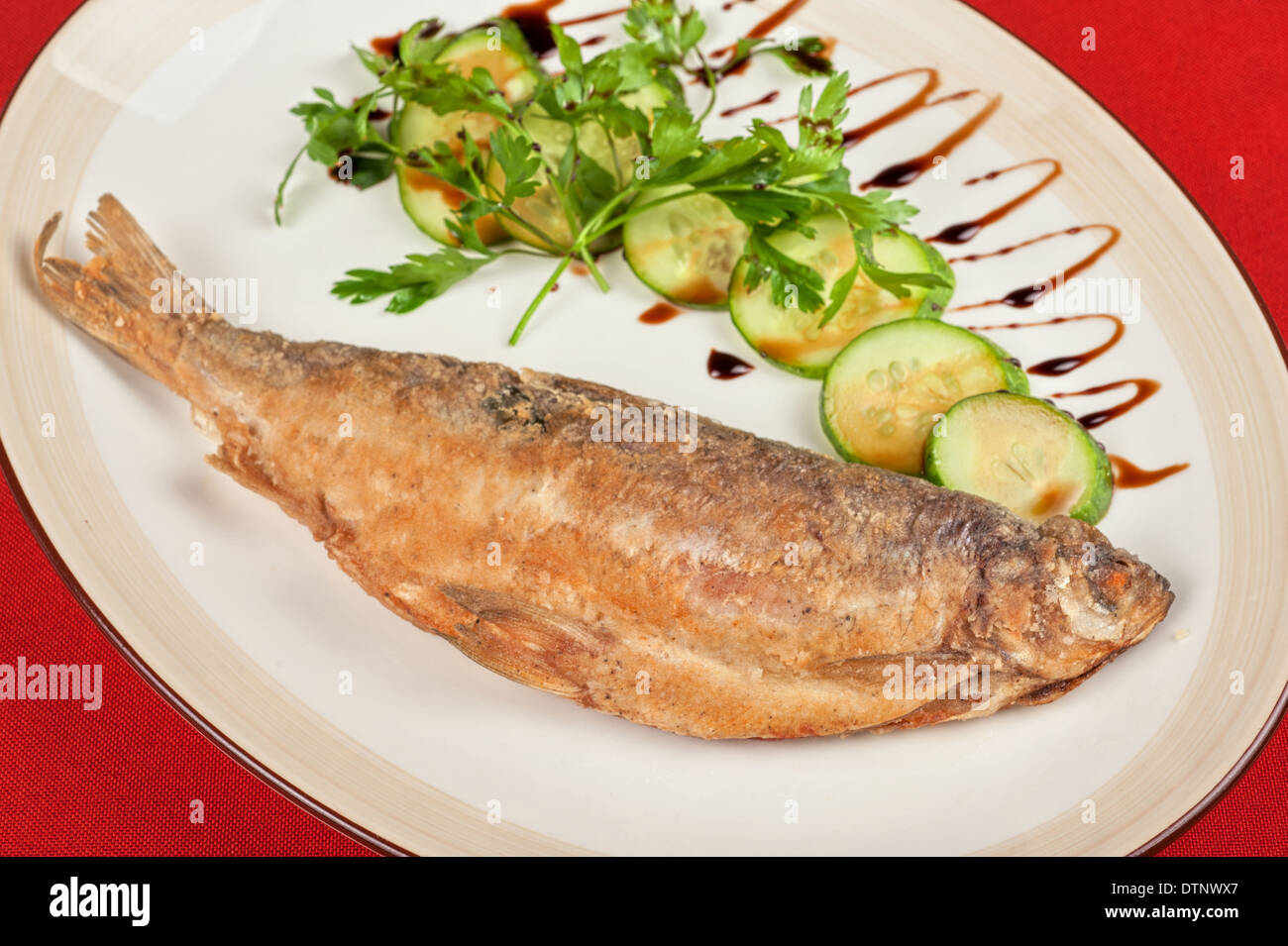 Fried peled fish Stock Photo - Alamy