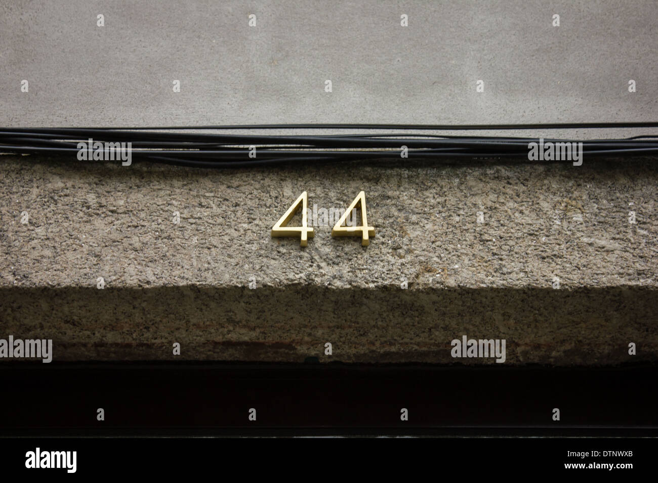 Door number 44 Stock Photo - Alamy