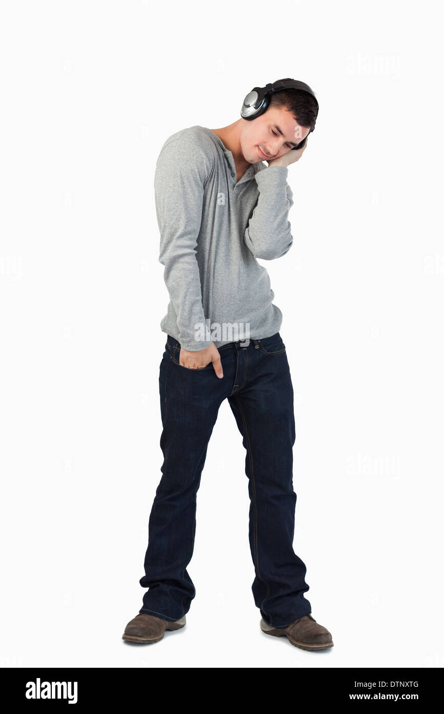 Young male enjoying music Stock Photo - Alamy