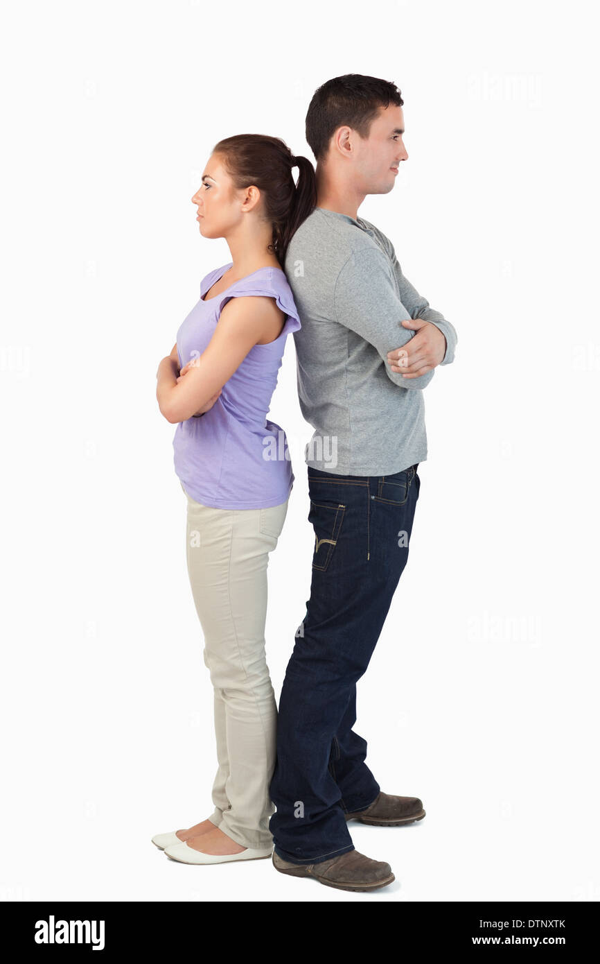 Two women back to back conflict hi-res stock photography and images - Alamy