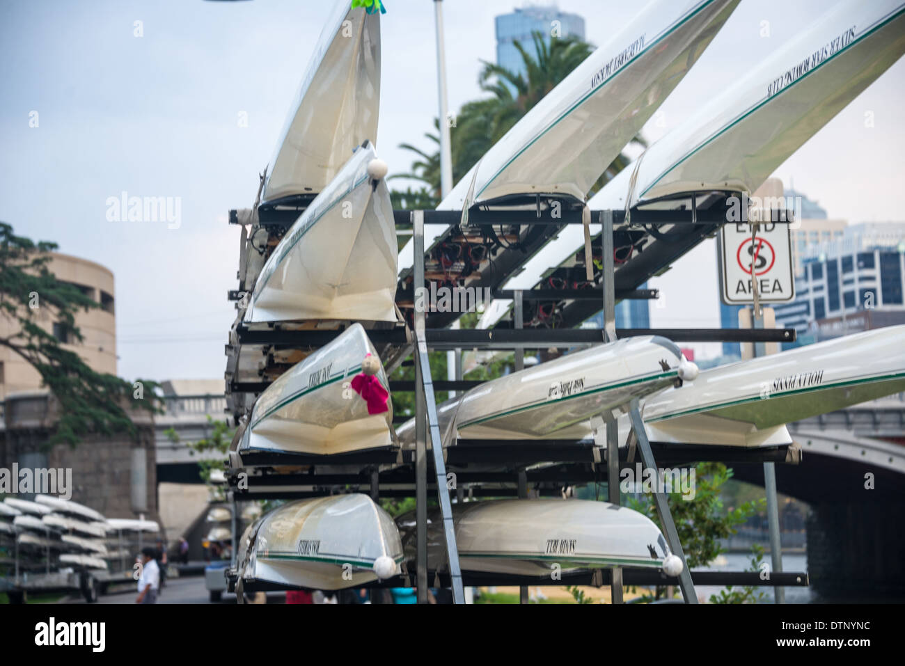 Row boats at rowing club house the hulls of the boats are stacked on a ...