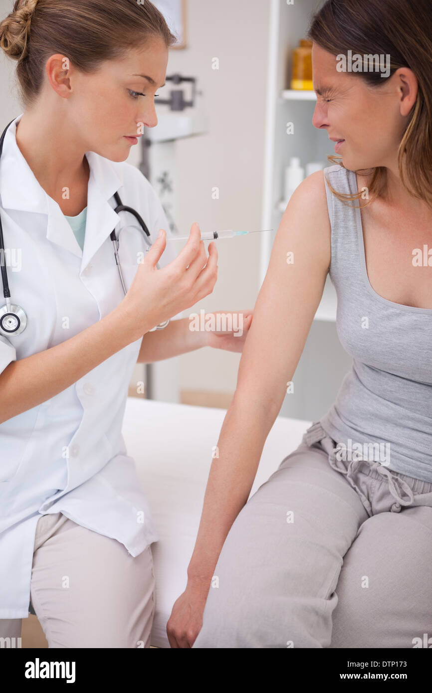 Receiving shot injection hi-res stock photography and images - Alamy