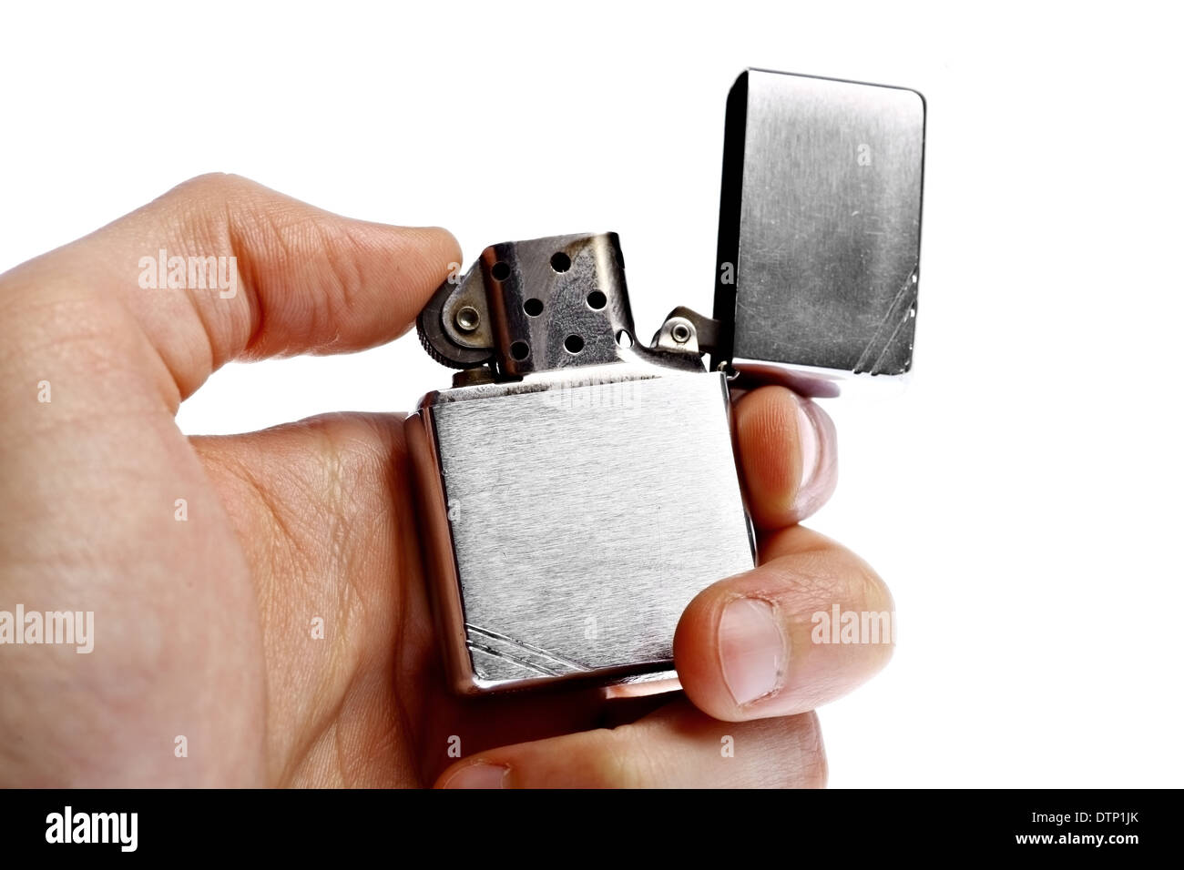 Hand holding vintage metal lighter isolated on white background Stock ...