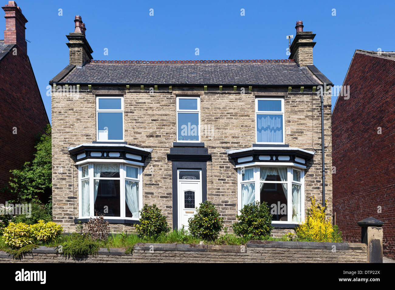 English house with a garden Stock Photo - Alamy