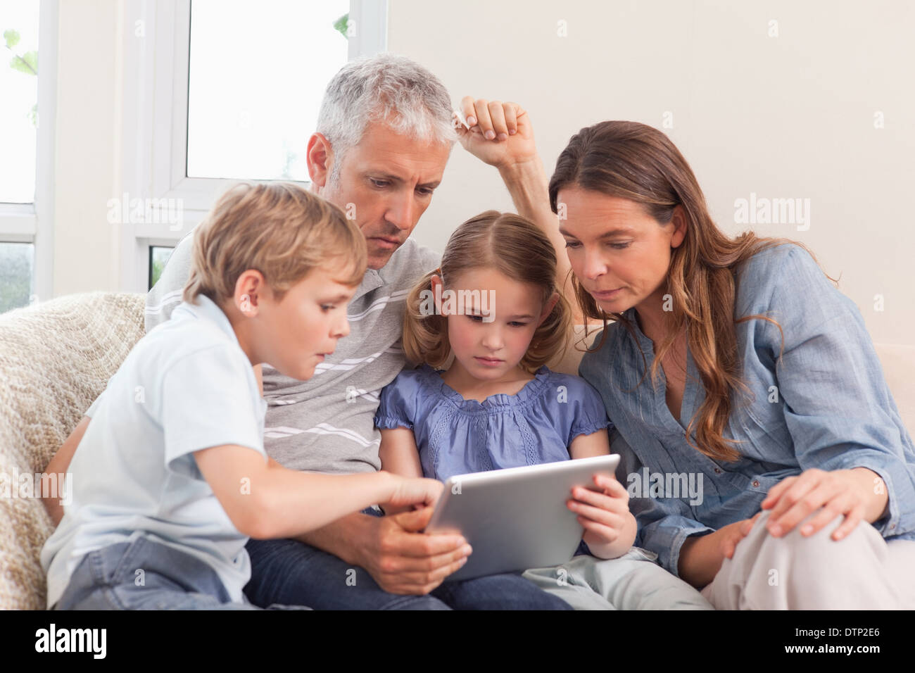 Father daughter using touchpad hi-res stock photography and images - Alamy