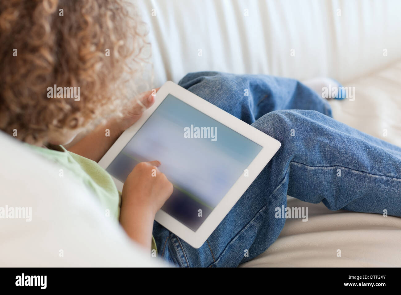Boy using computer back view hi-res stock photography and images - Alamy