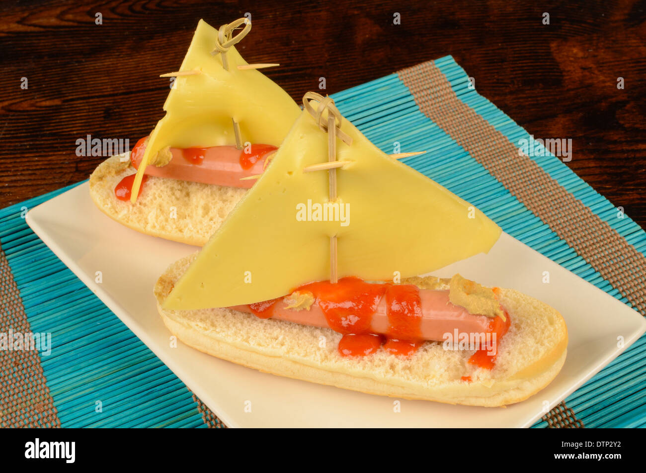 A hot dog decorated as a sailboat, creative kid snack Stock Photo - Alamy