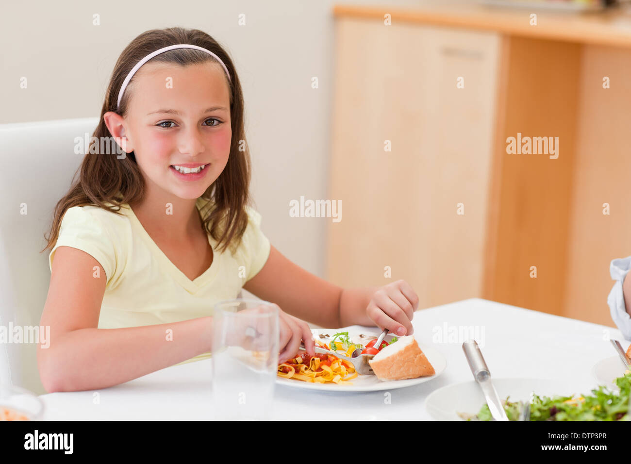Girl having dinner table hi-res stock photography and images - Alamy