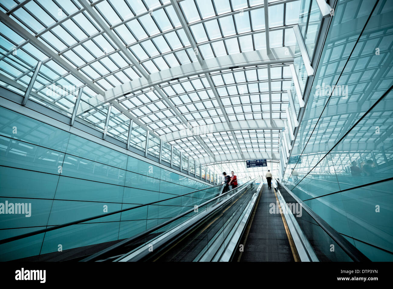 moving escalator in modern airport hall Stock Photo - Alamy