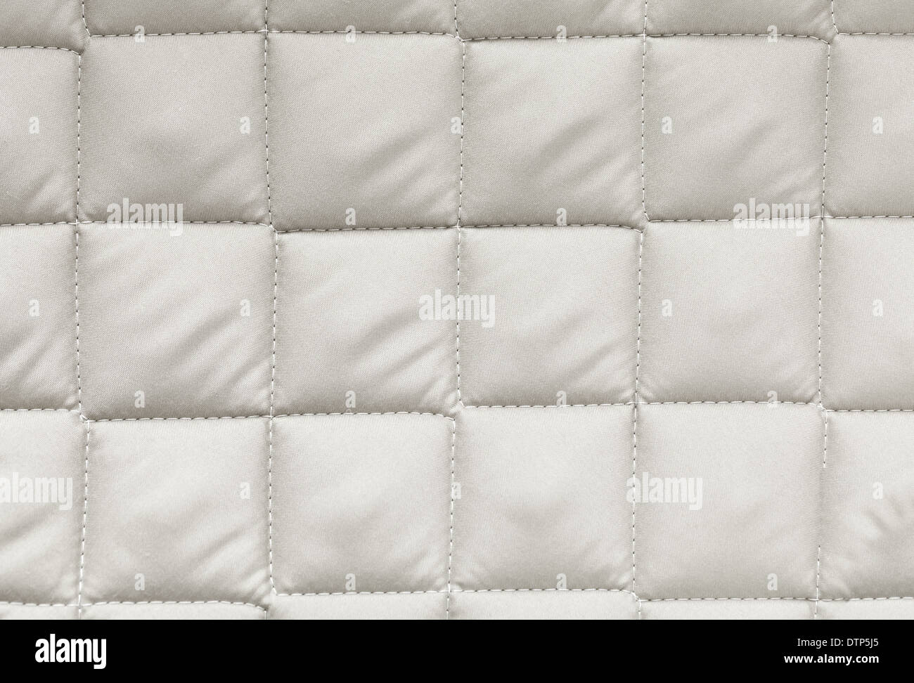 Closeup background photo of modern gray comforter Stock Photo - Alamy
