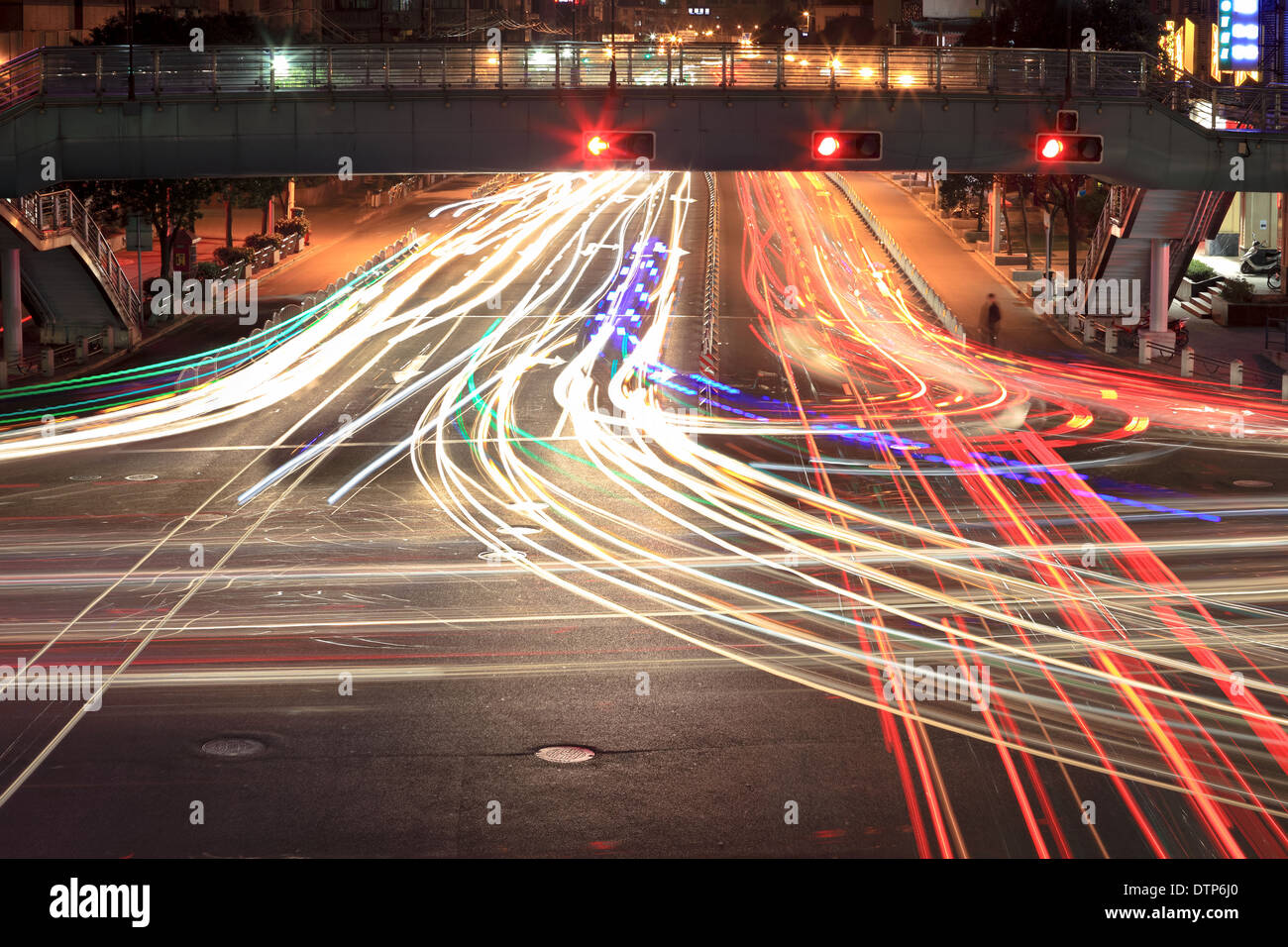 light traces on crossroad at night Stock Photo - Alamy