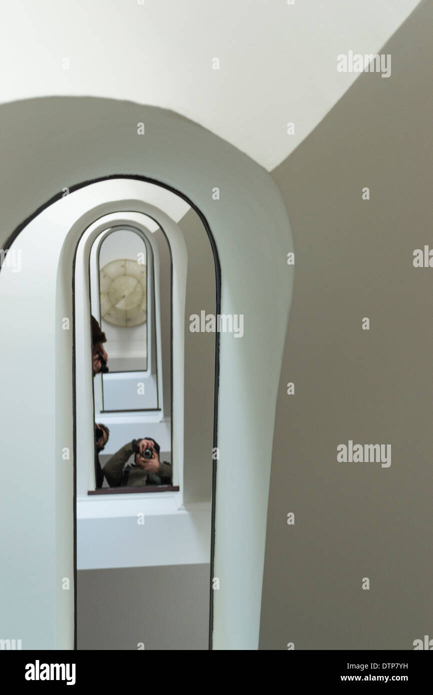 Photographers looking down the stairs Stock Photo - Alamy