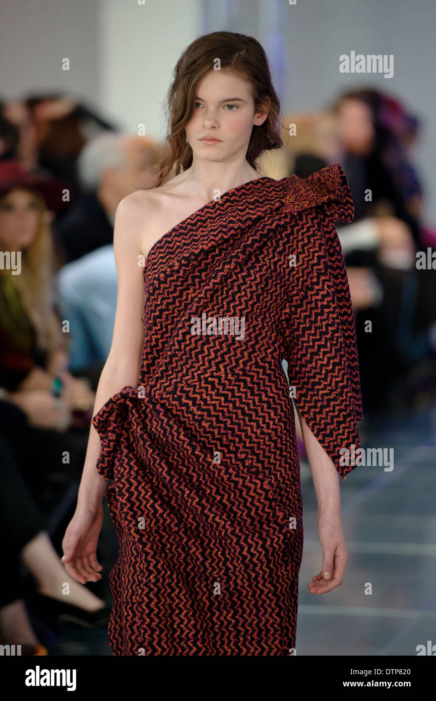 A model wears a design created by Mark Fast during London Fashion Week ...