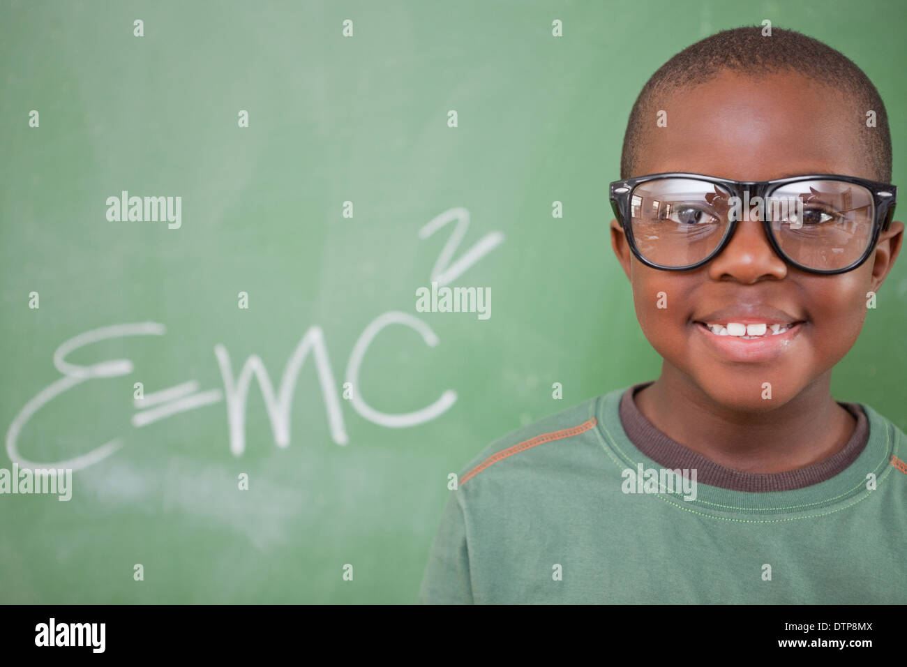 Smart schoolboy posing Stock Photo - Alamy