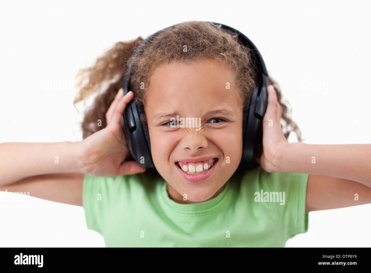 Cute girl listening to music Stock Photo - Alamy