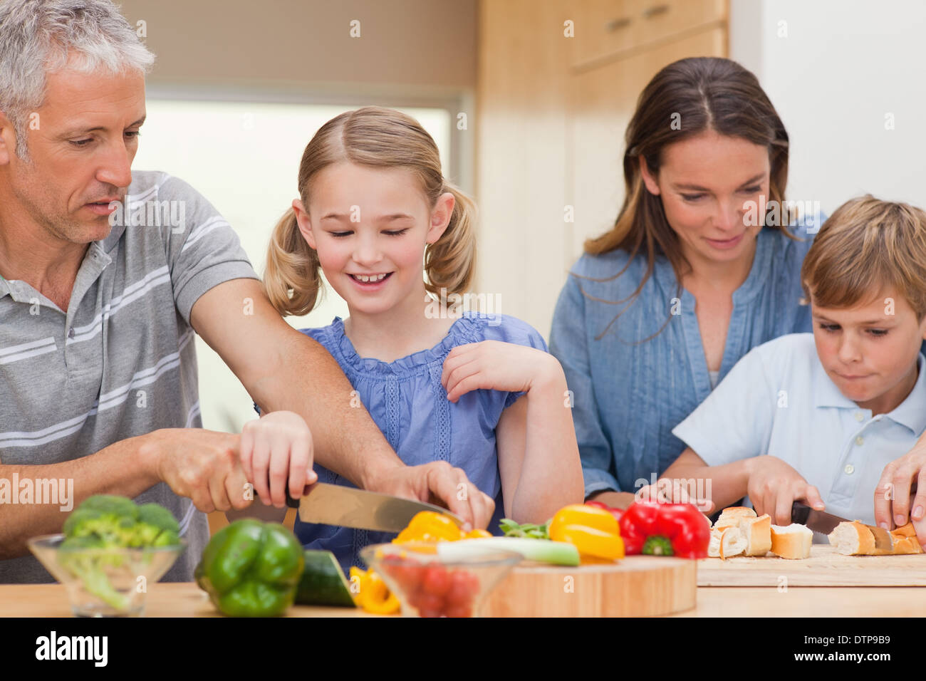 Lovely family cooking Stock Photo - Alamy