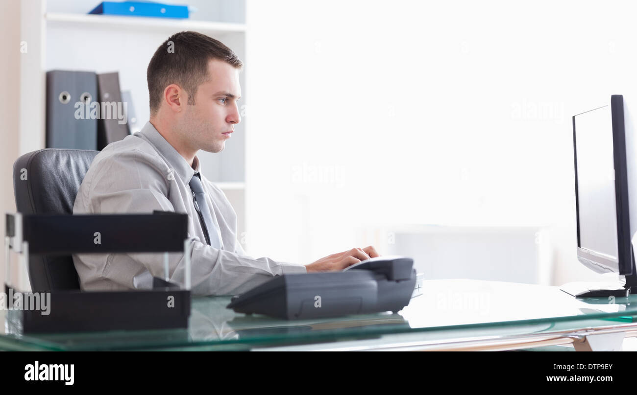 Businessman writing an email Stock Photo - Alamy
