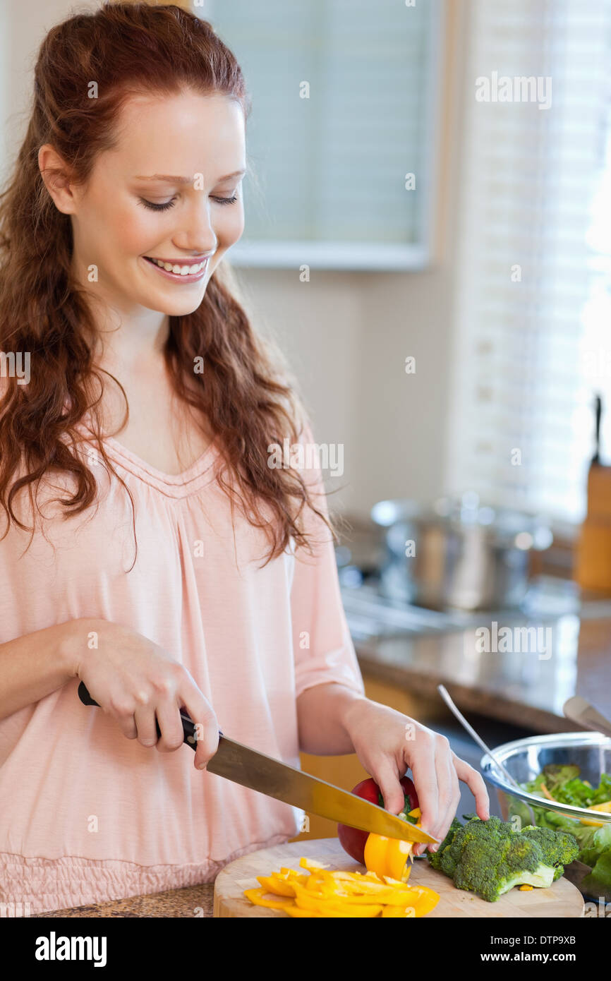 Woman cutting vegetables Stock Photo - Alamy