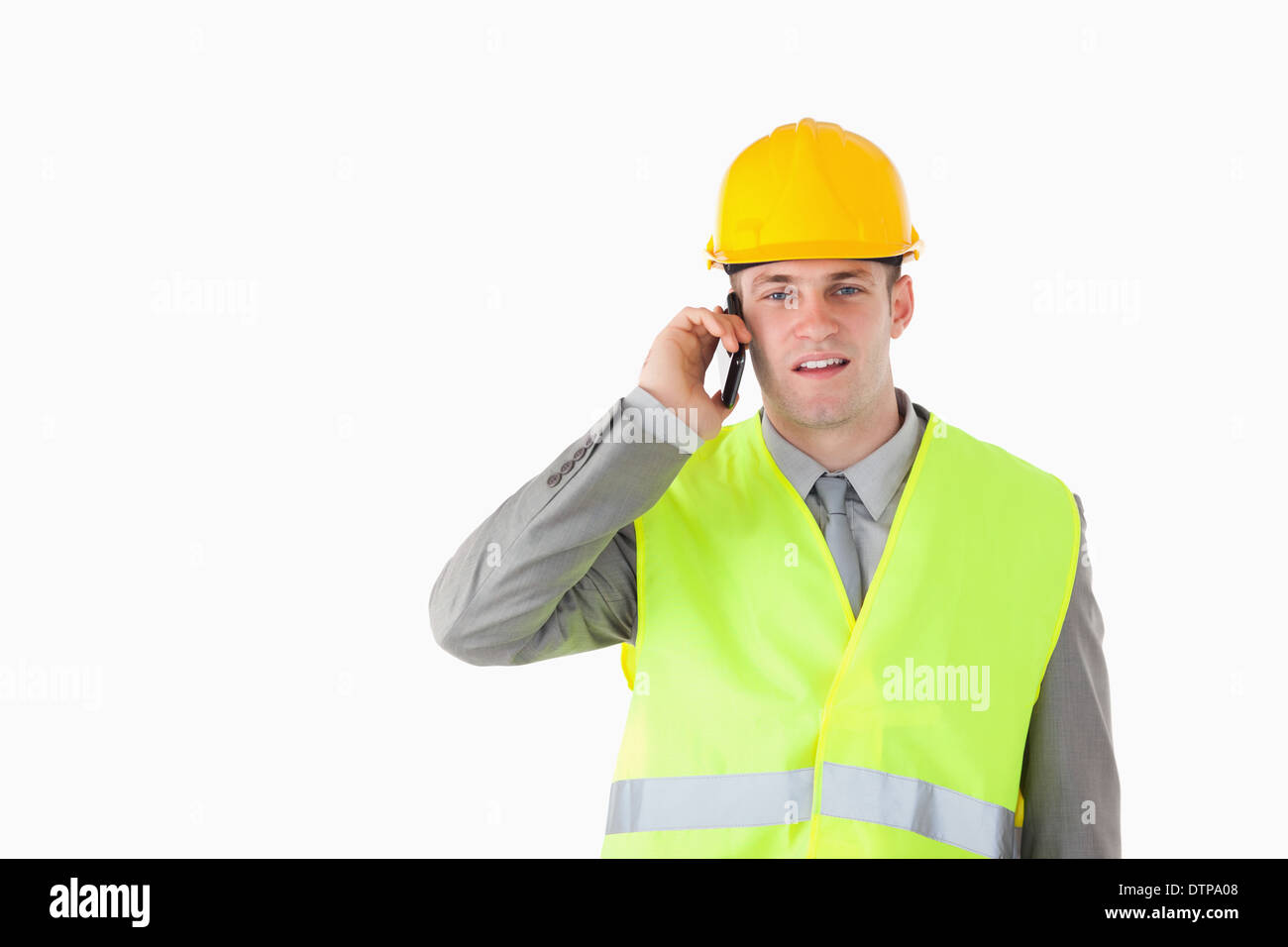 Builder making a phone call Stock Photo - Alamy