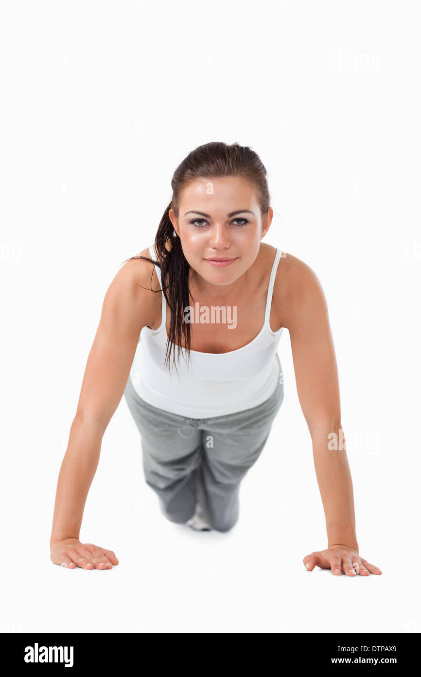 Beautiful woman doing push ups Cut Out Stock Images & Pictures - Alamy
