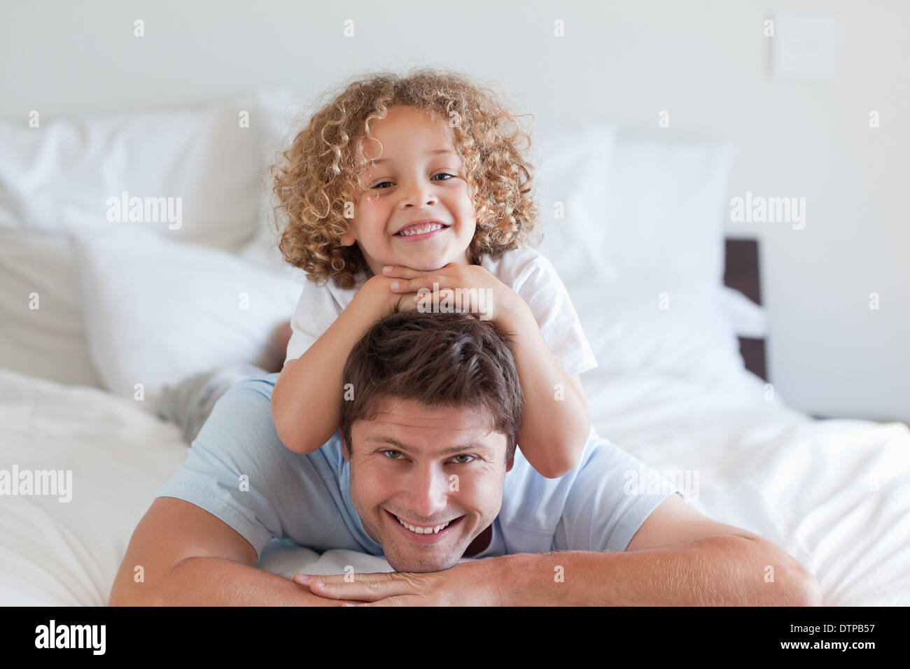 Cuddling child back hi-res stock photography and images - Alamy