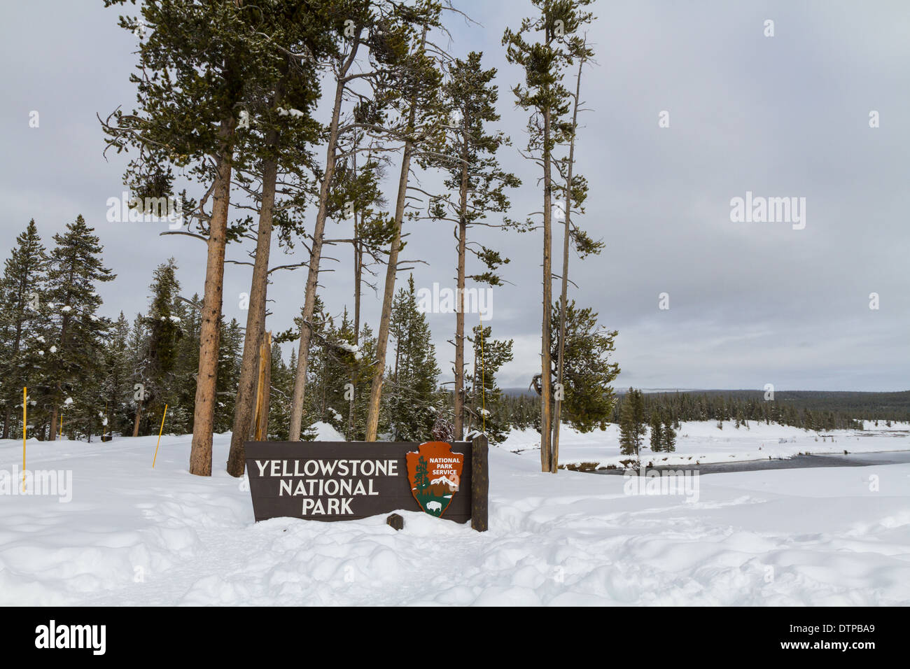 Yellowstone national park entrance sign in winter Stock Photo - Alamy