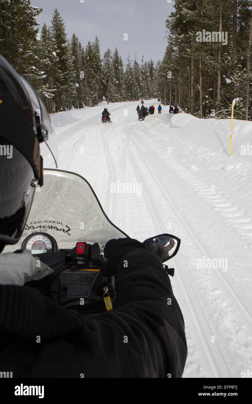 Snowmobile Tour through the Yellowstone National Stock Photo - Alamy