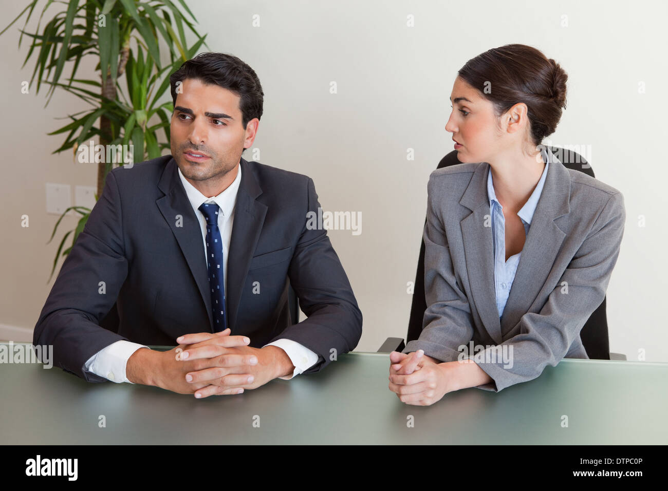 Focused business people negotiating Stock Photo - Alamy