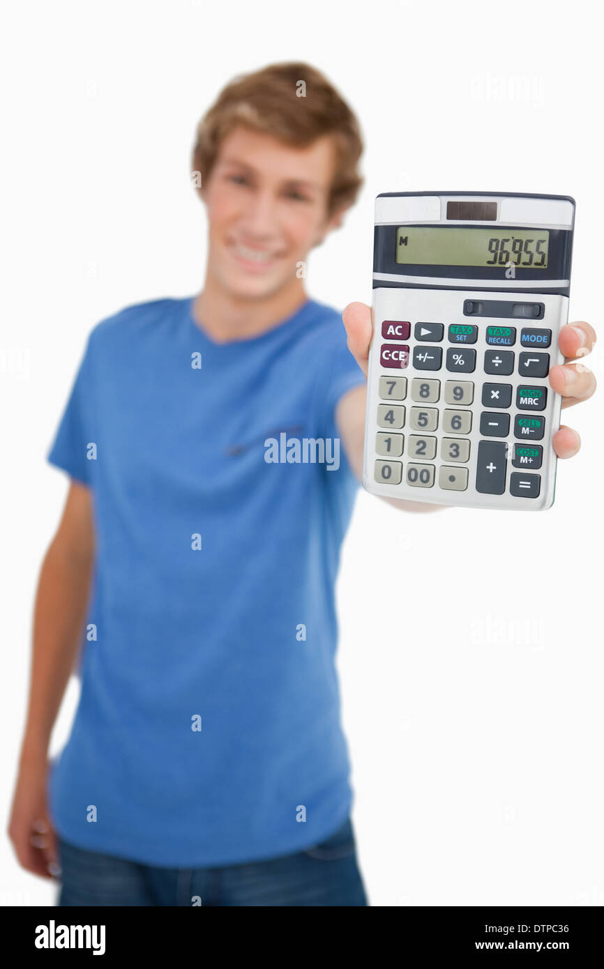 Young man calculator showing hi-res stock photography and images - Alamy