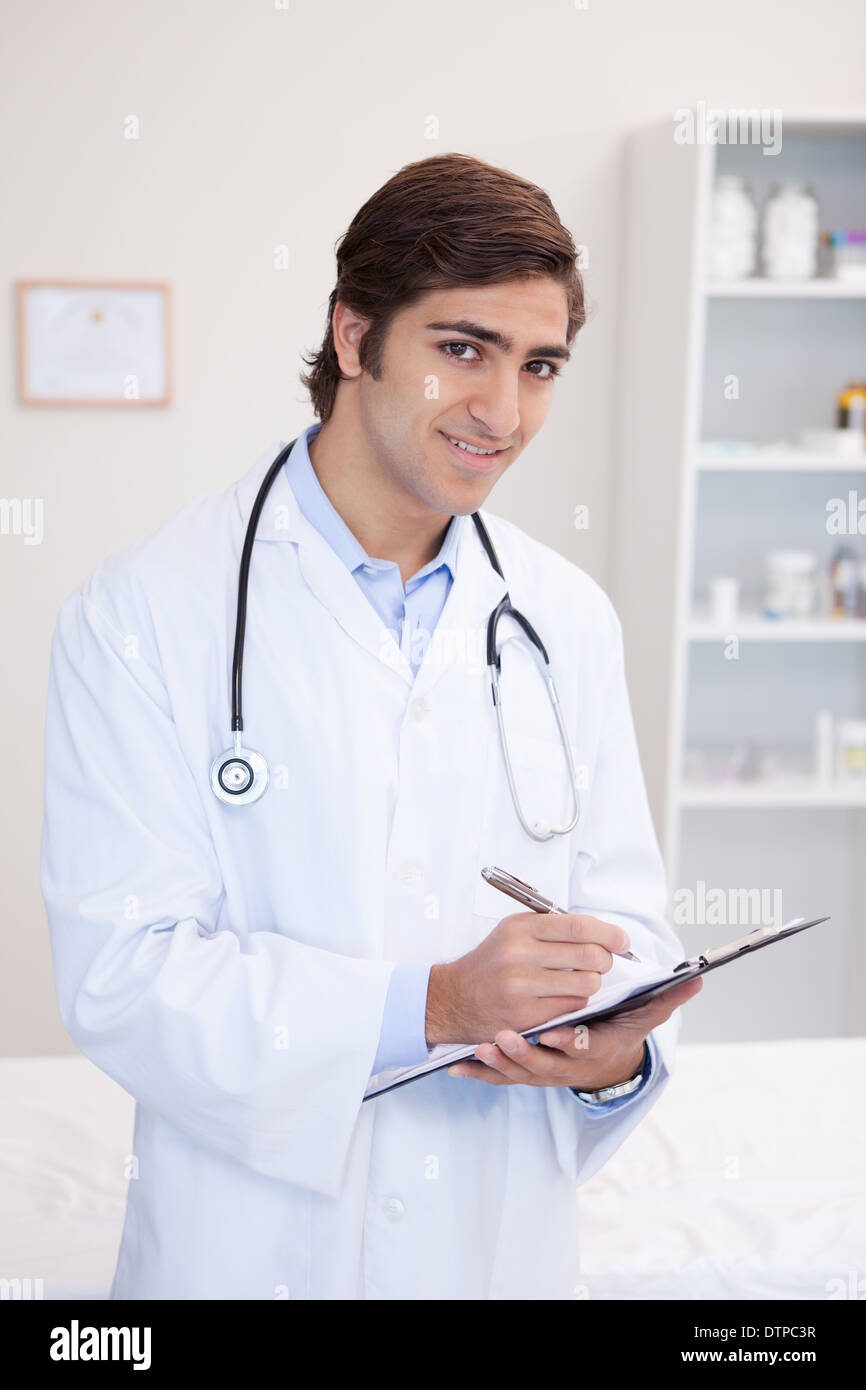 Male physician taking notes hi-res stock photography and images - Alamy