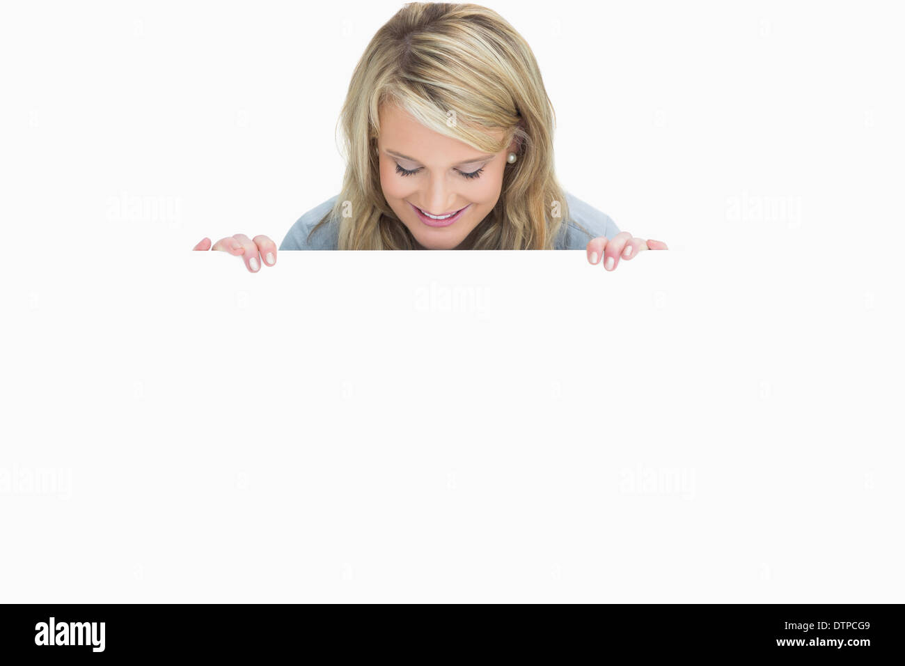 Woman holding a notice Stock Photo - Alamy