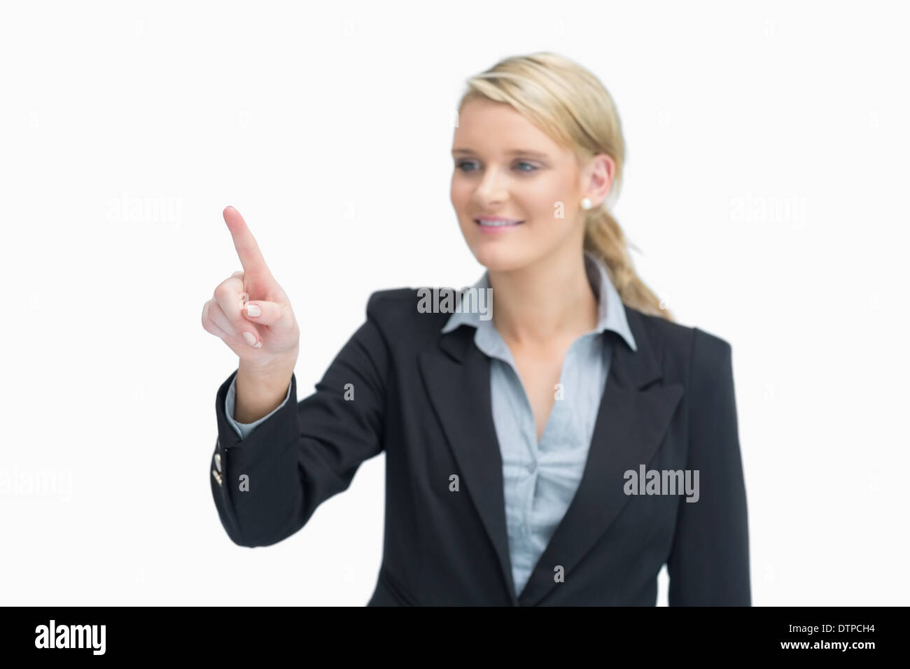 Businesswoman indicating something Stock Photo - Alamy