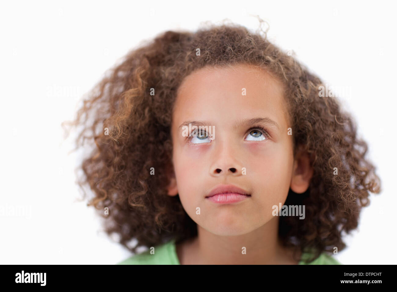 Cute girl looking above hi-res stock photography and images - Alamy