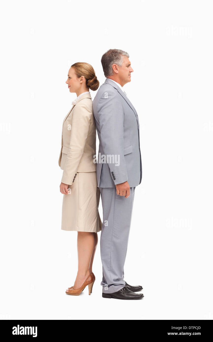 Business people back to back Stock Photo - Alamy