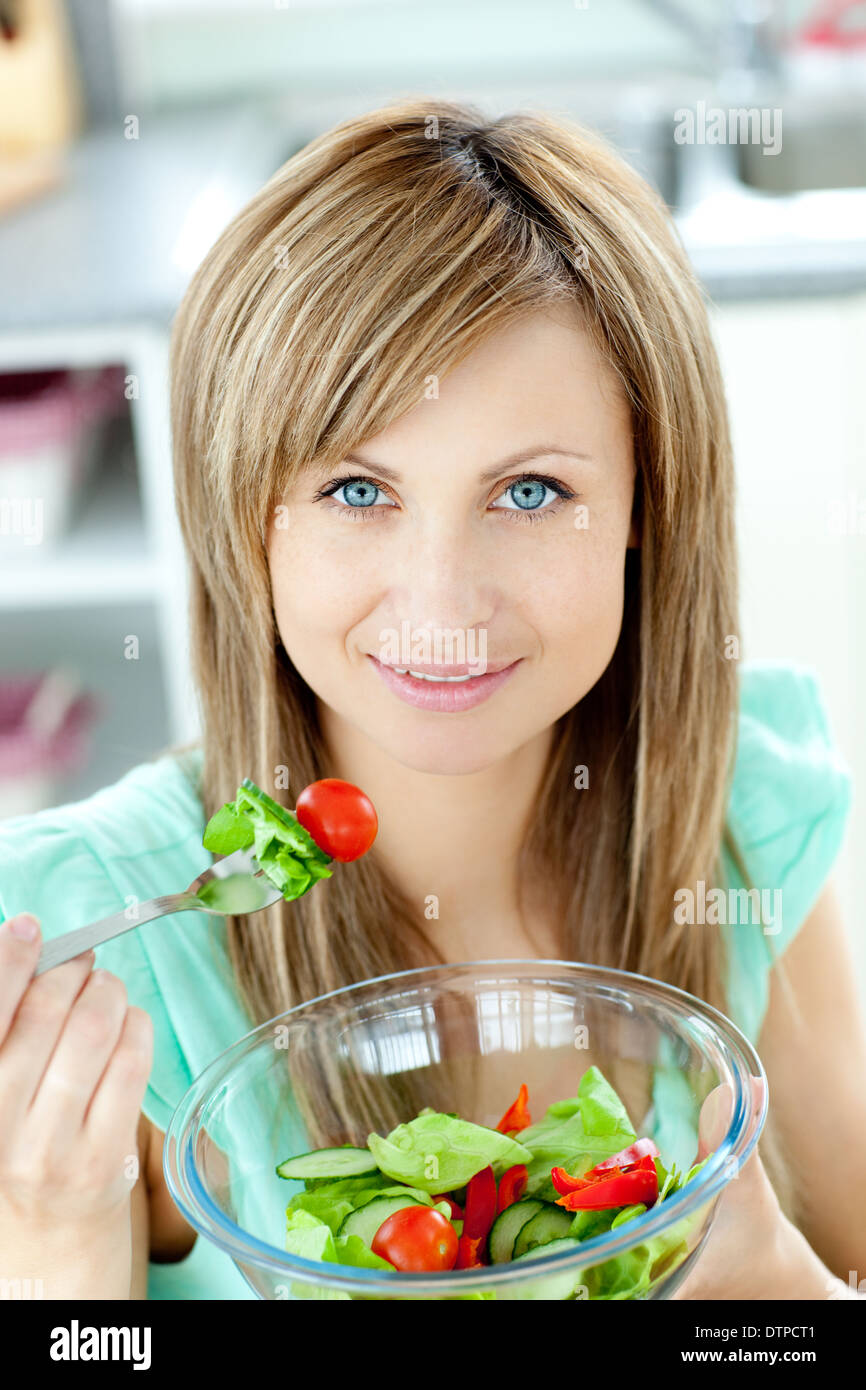 Glad woman eating healthy salad hi-res stock photography and images - Alamy