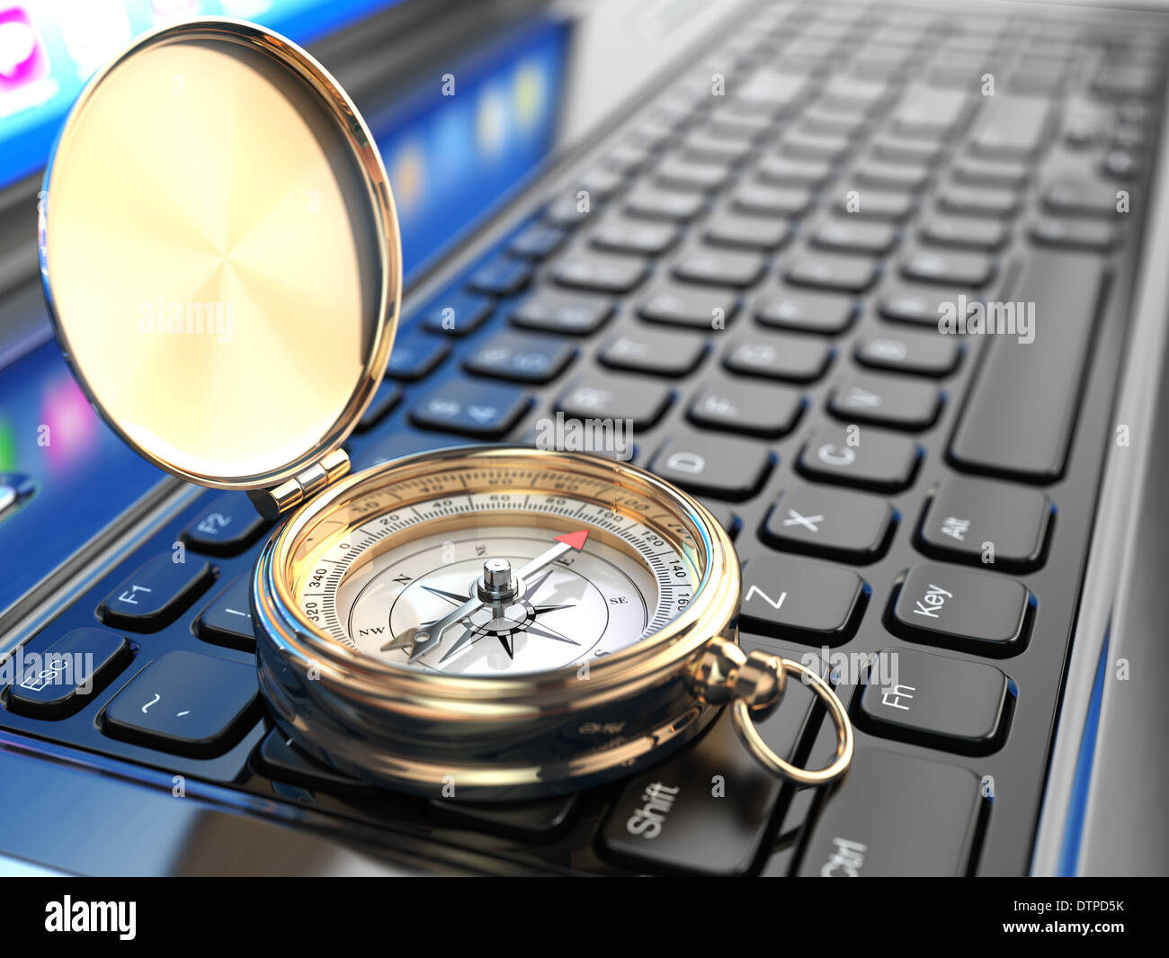 Online navigation. Compass on laptop keyboard. 3d Stock Photo - Alamy
