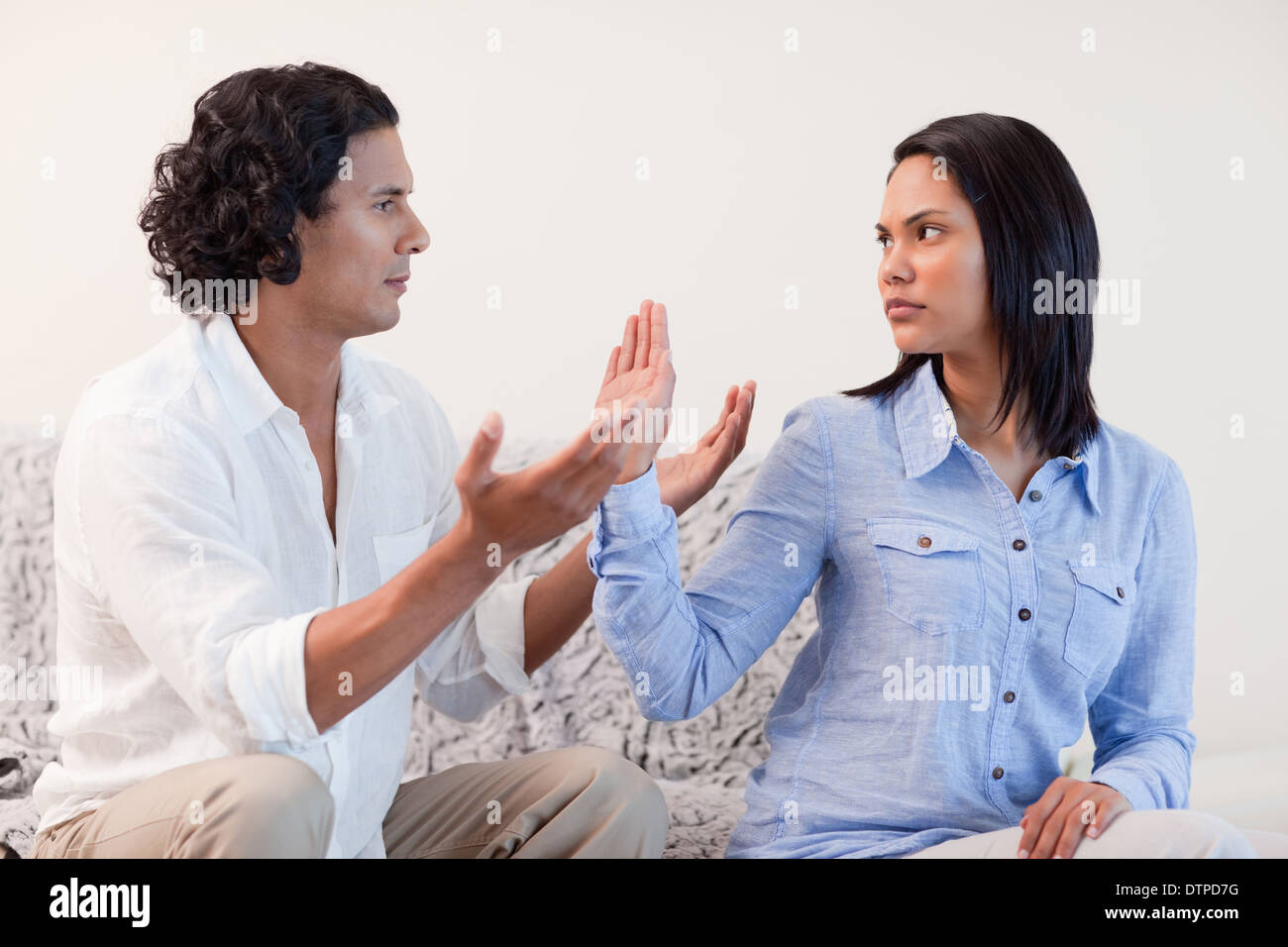 Male begging his girlfriend for pardon Stock Photo - Alamy