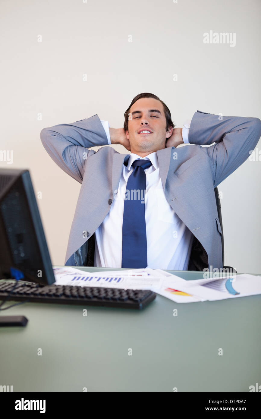 Businessman taking a small break Stock Photo - Alamy