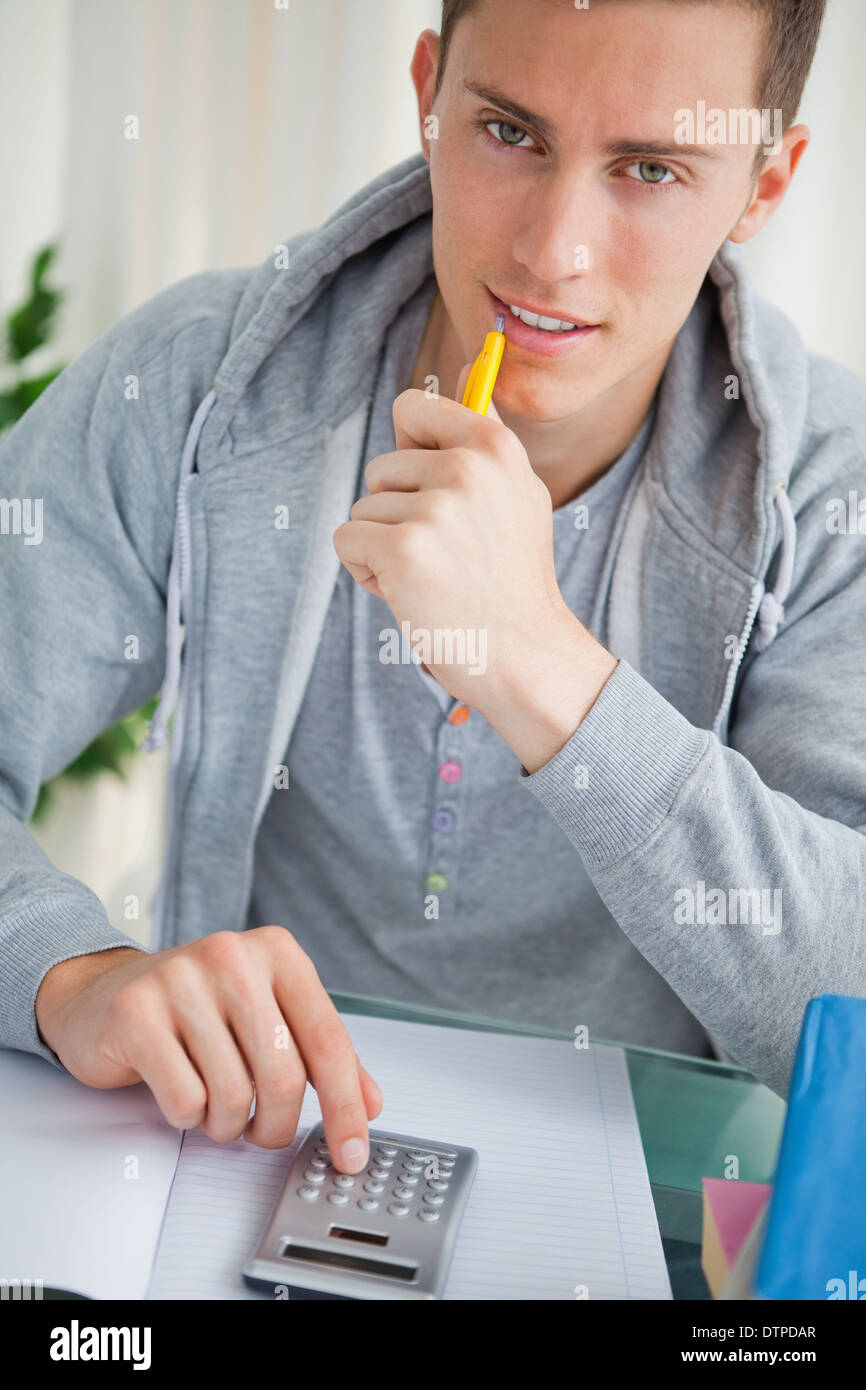 Student using a calculator hi-res stock photography and images - Alamy