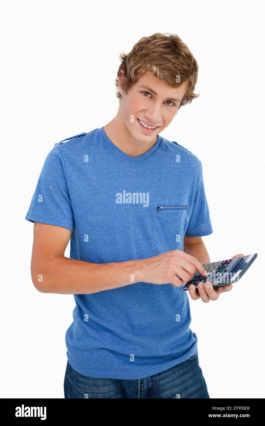 Man using calculator and smiling hi-res stock photography and images ...