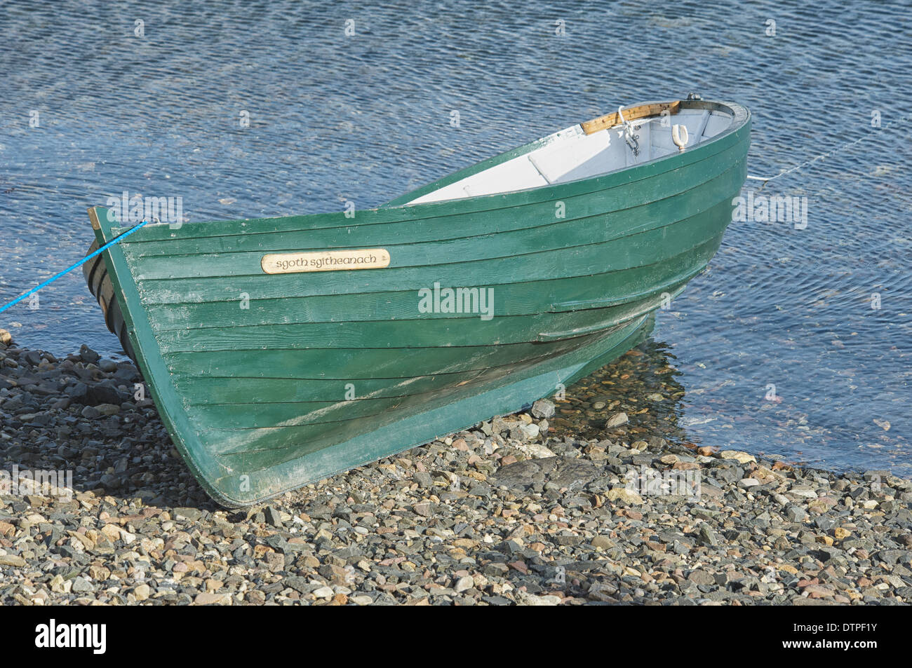 A moored green wooden fishing boat Stock Photo - Alamy