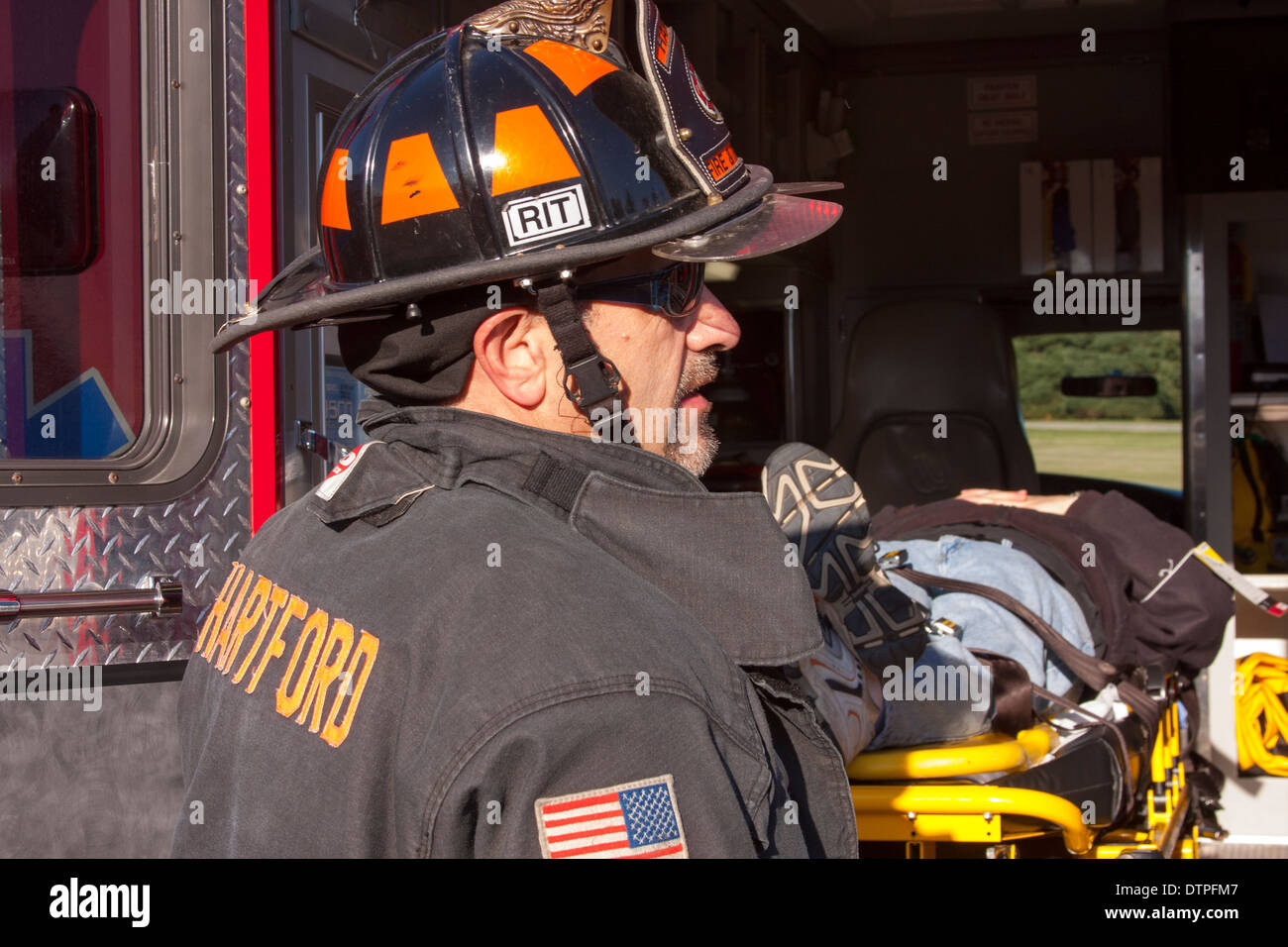 Firefighter rescue victim hi-res stock photography and images - Alamy