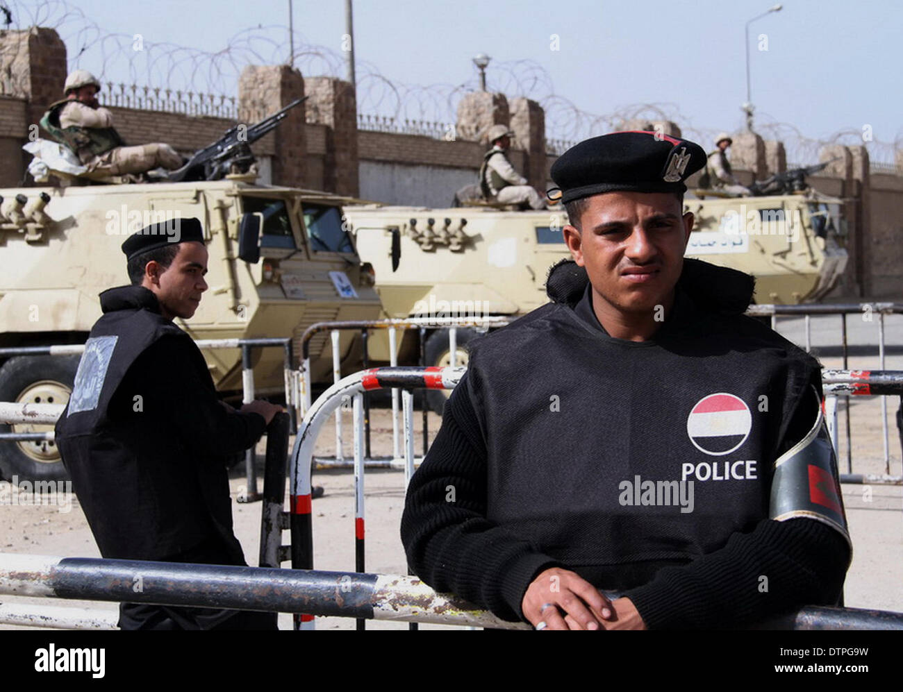 Cairo, Cairo, Egypt. 22nd Feb, 2014. Egyptian security forces stand ...