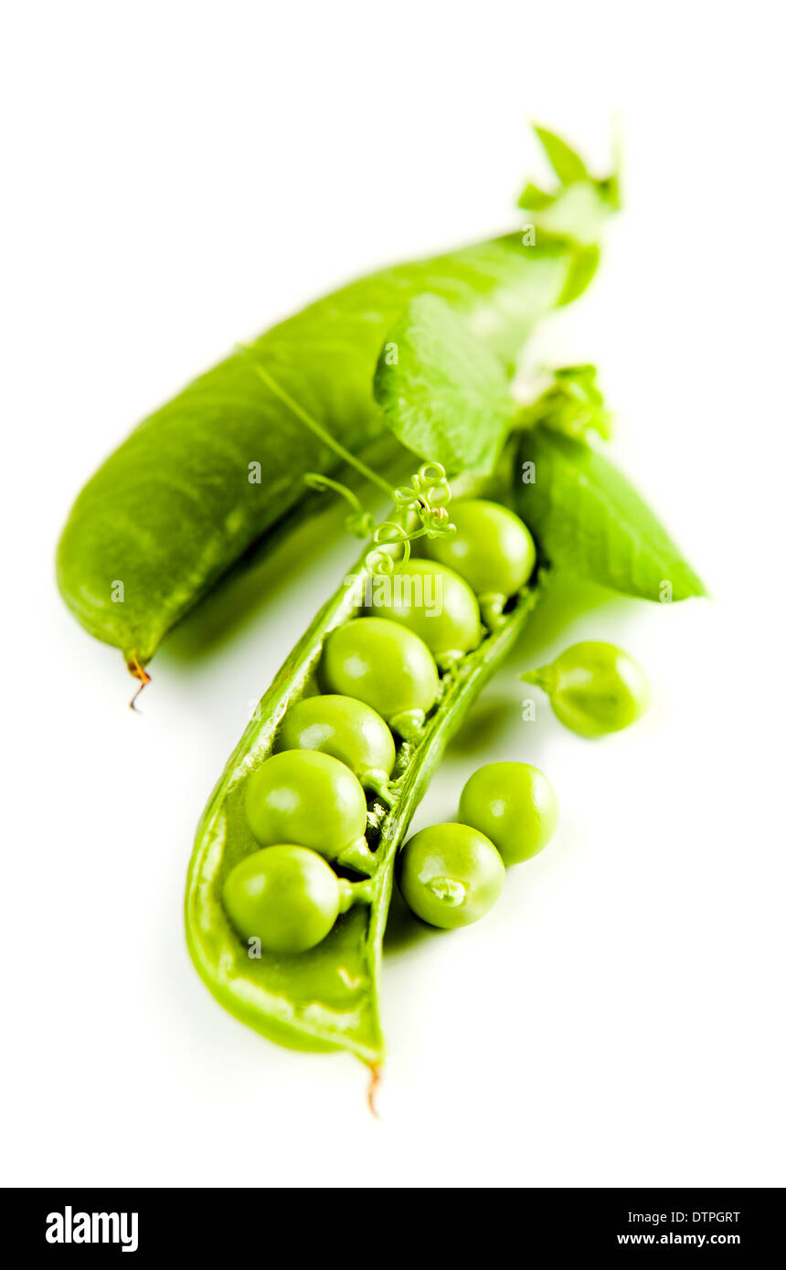 green peas isolated on a white background Stock Photo - Alamy