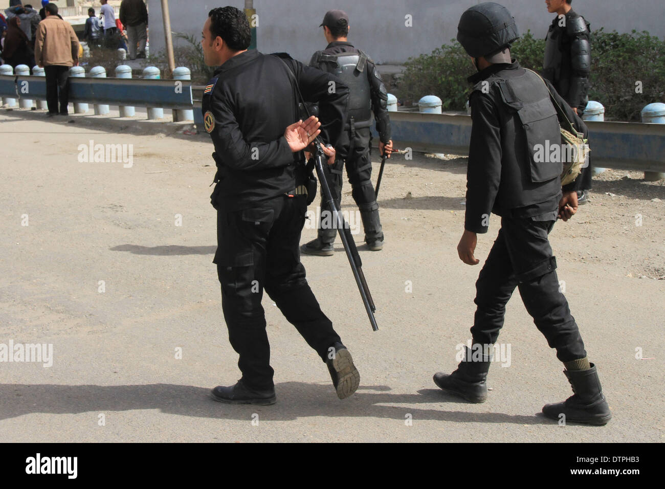 Cairo, Cairo, Egypt. 22nd Feb, 2014. Egyptian security forces stand ...