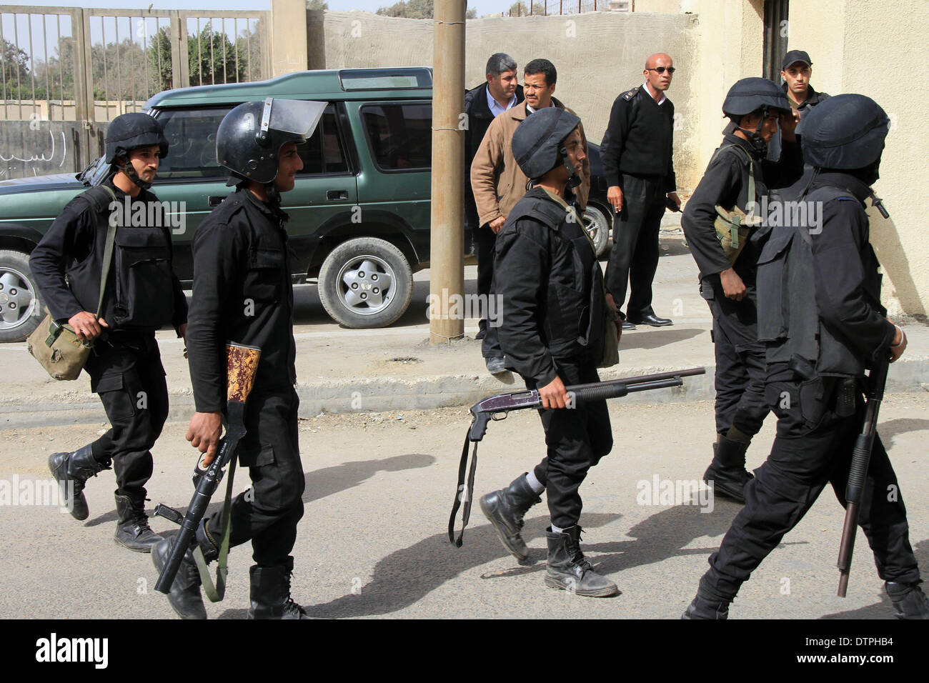 Cairo, Cairo, Egypt. 22nd Feb, 2014. Egyptian security forces stand ...