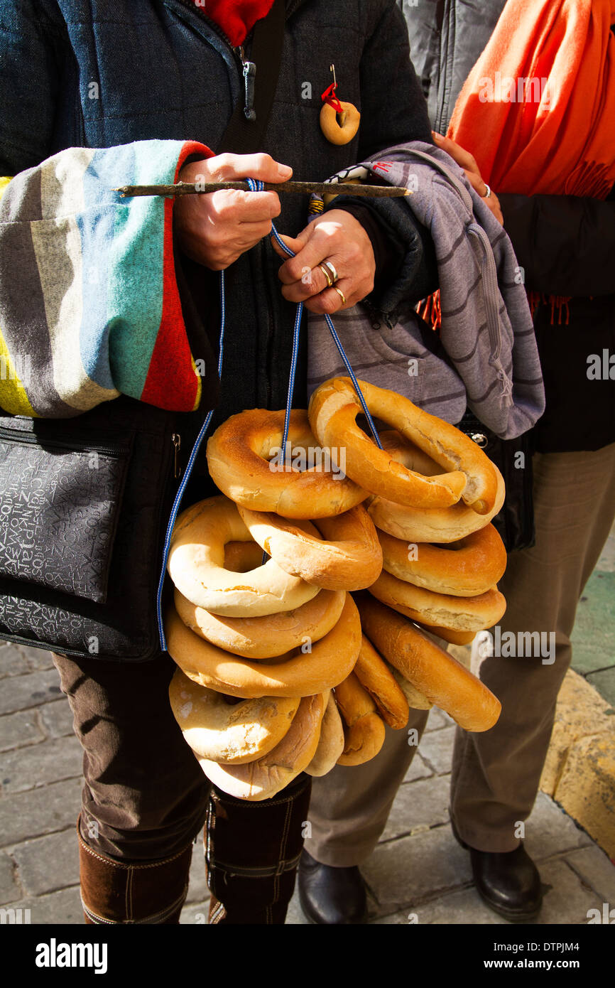 A scene at the Festival of the Holy Bread where people throw bread and ...
